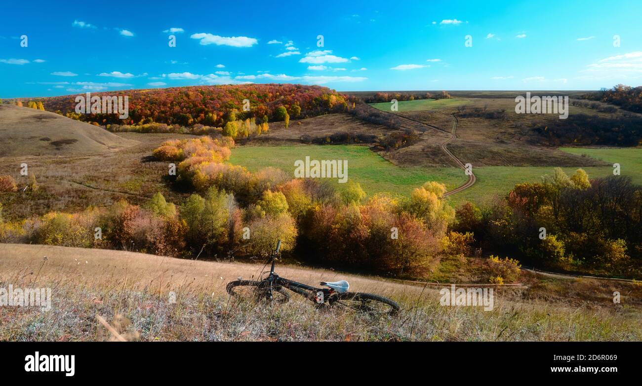 Aerial view of outdoor cycling. Mountain bike in wild nature landscape ...