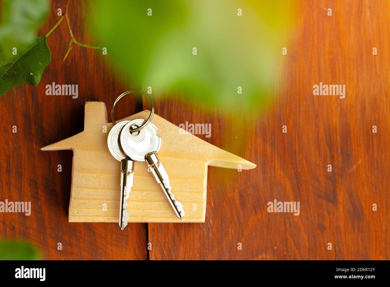 Wooden house model miniature and house keys Stock Photo - Alamy