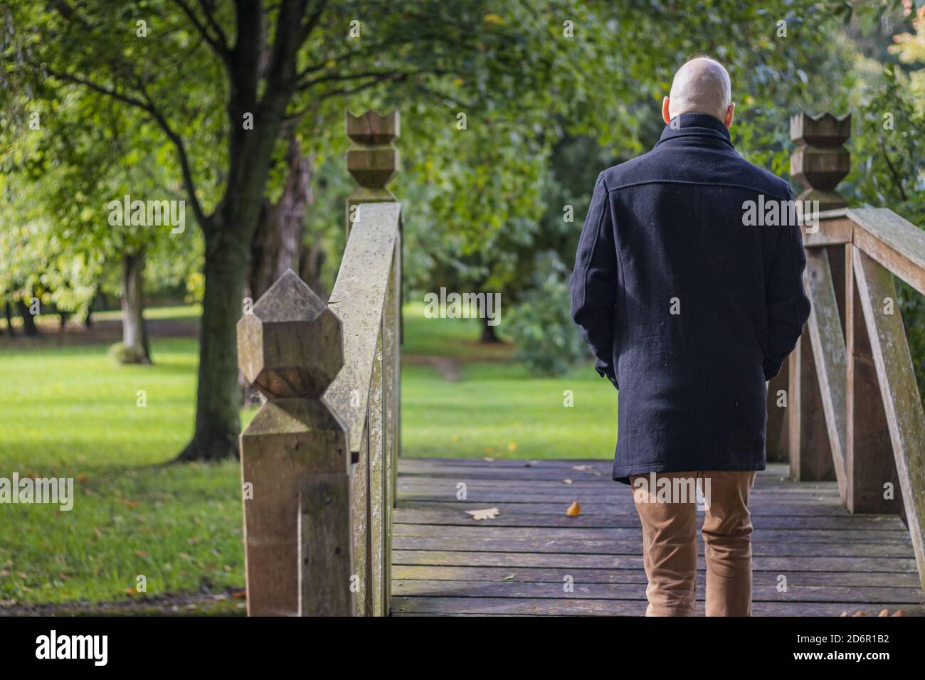 Old man walks over bridge hi-res stock photography and images - Alamy