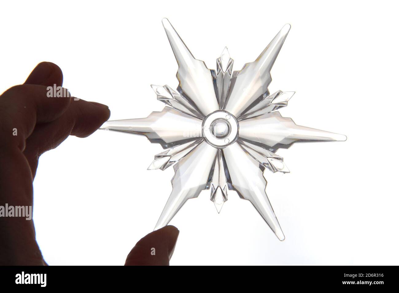 snoflake in the human hand isolated on the white background Stock Photo ...