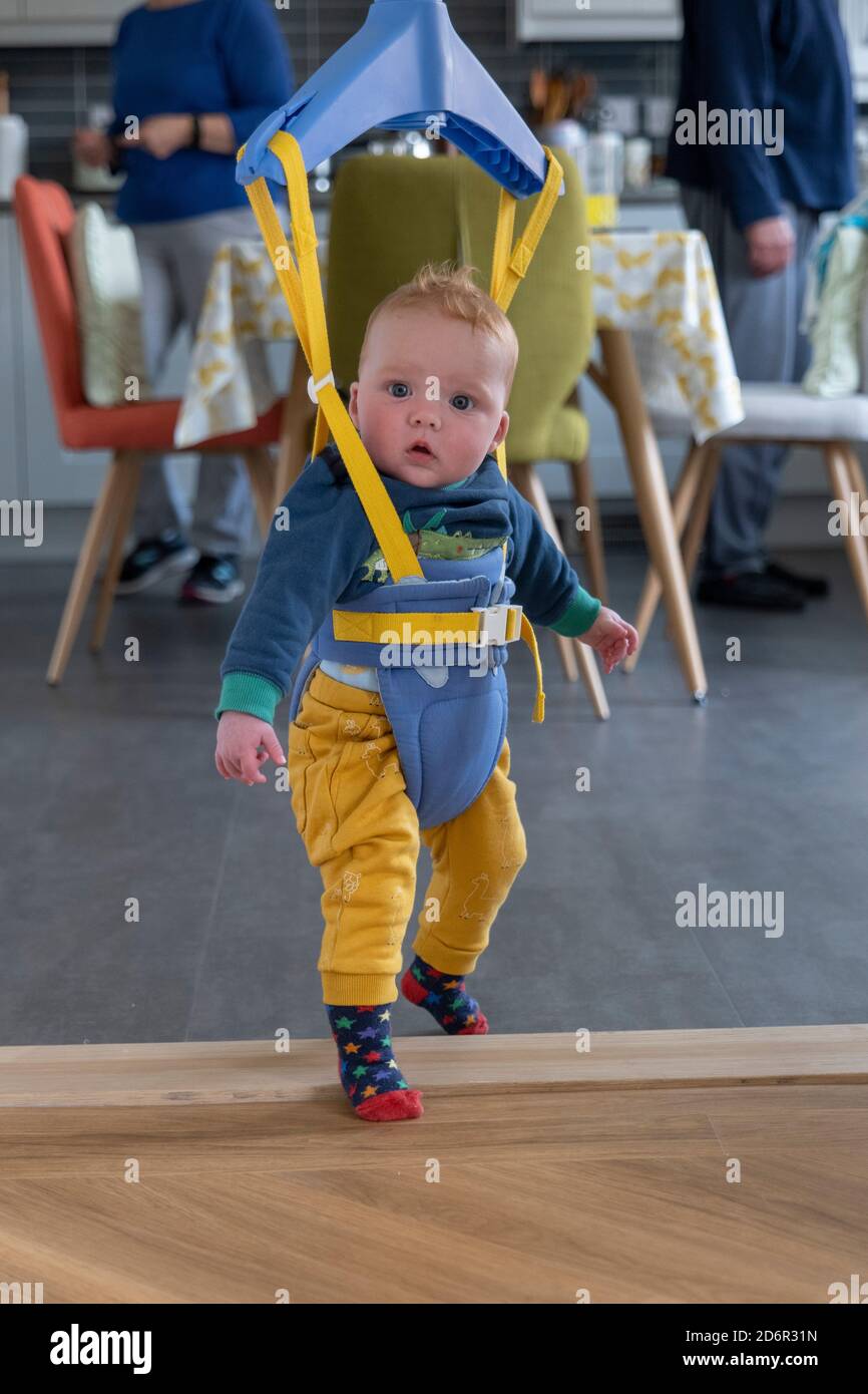 Baby in bouncer boy hi-res stock photography and images - Alamy