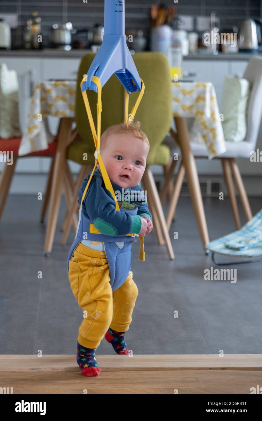 Baby in bouncer boy hi-res stock photography and images - Alamy