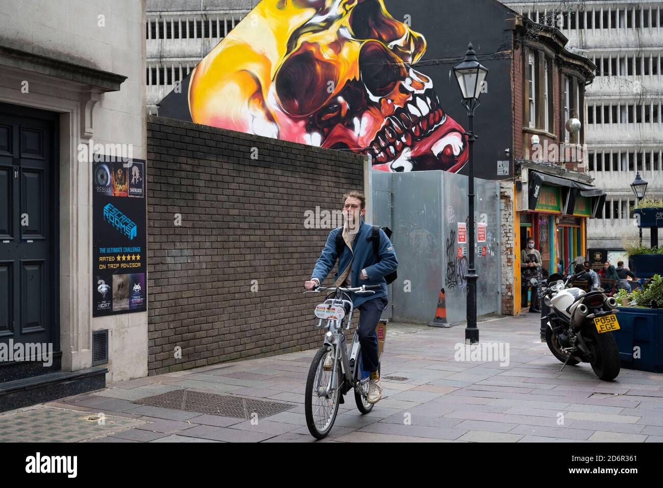 A man cycles through Cardiff city centre during the coronavirus ...