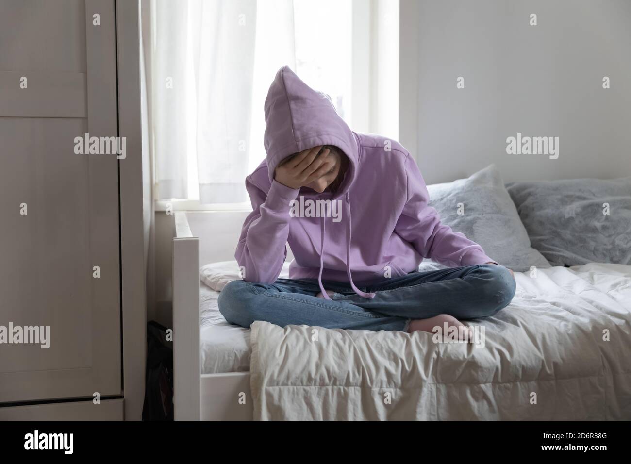 Introvert teen girl suffer from psychological problems Stock Photo - Alamy