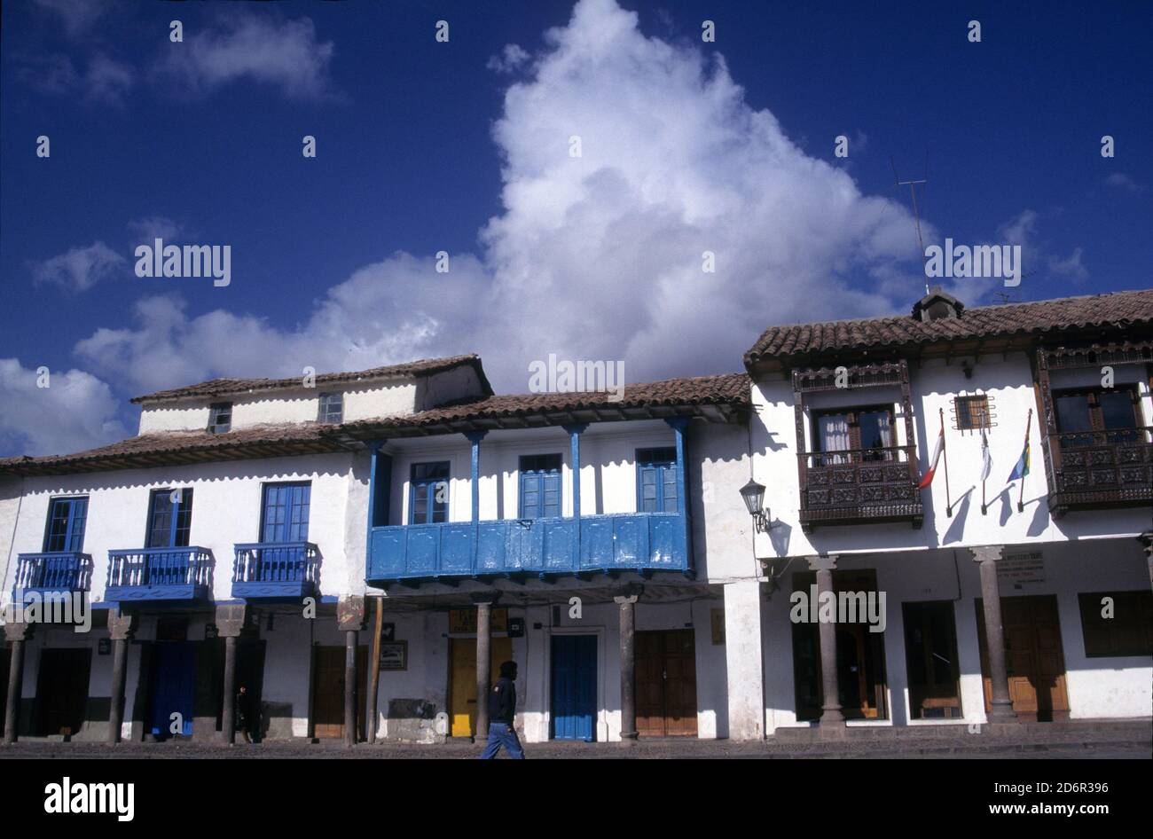 A row of historic two-storey houses in the Plaza de Armas, the main ...