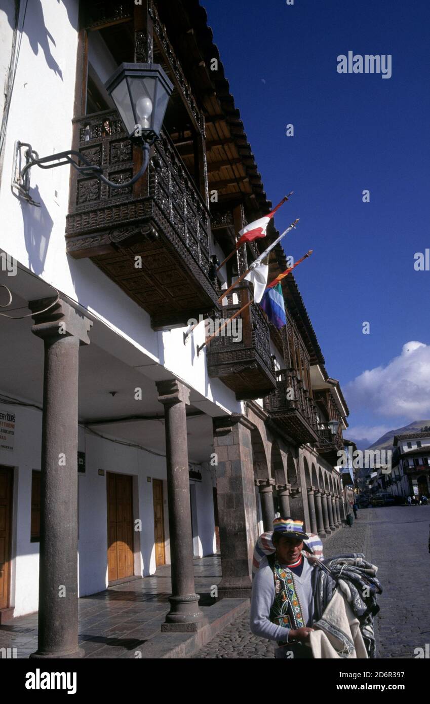 A row of historic two-storey houses in the Plaza de Armas, the main ...