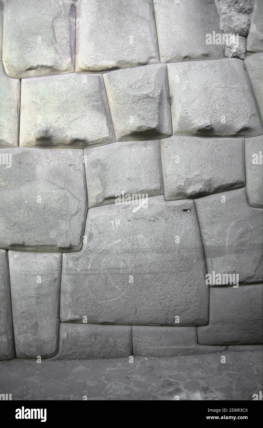 Made by the Incas, massive stone blocks form walls that still line some ...