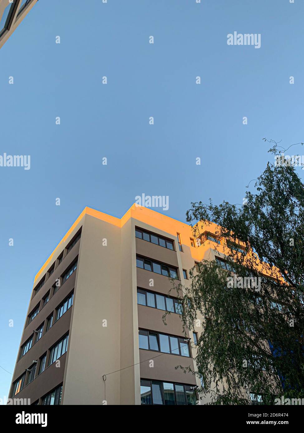 Vertical low angle shot of a residential building covered by the ...
