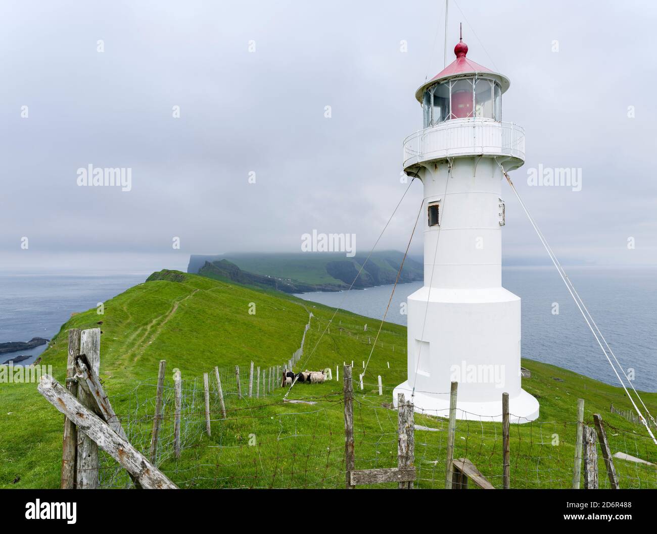 The lighthouse on Mykinesholmur, The island Mykines, part of the Faroe ...