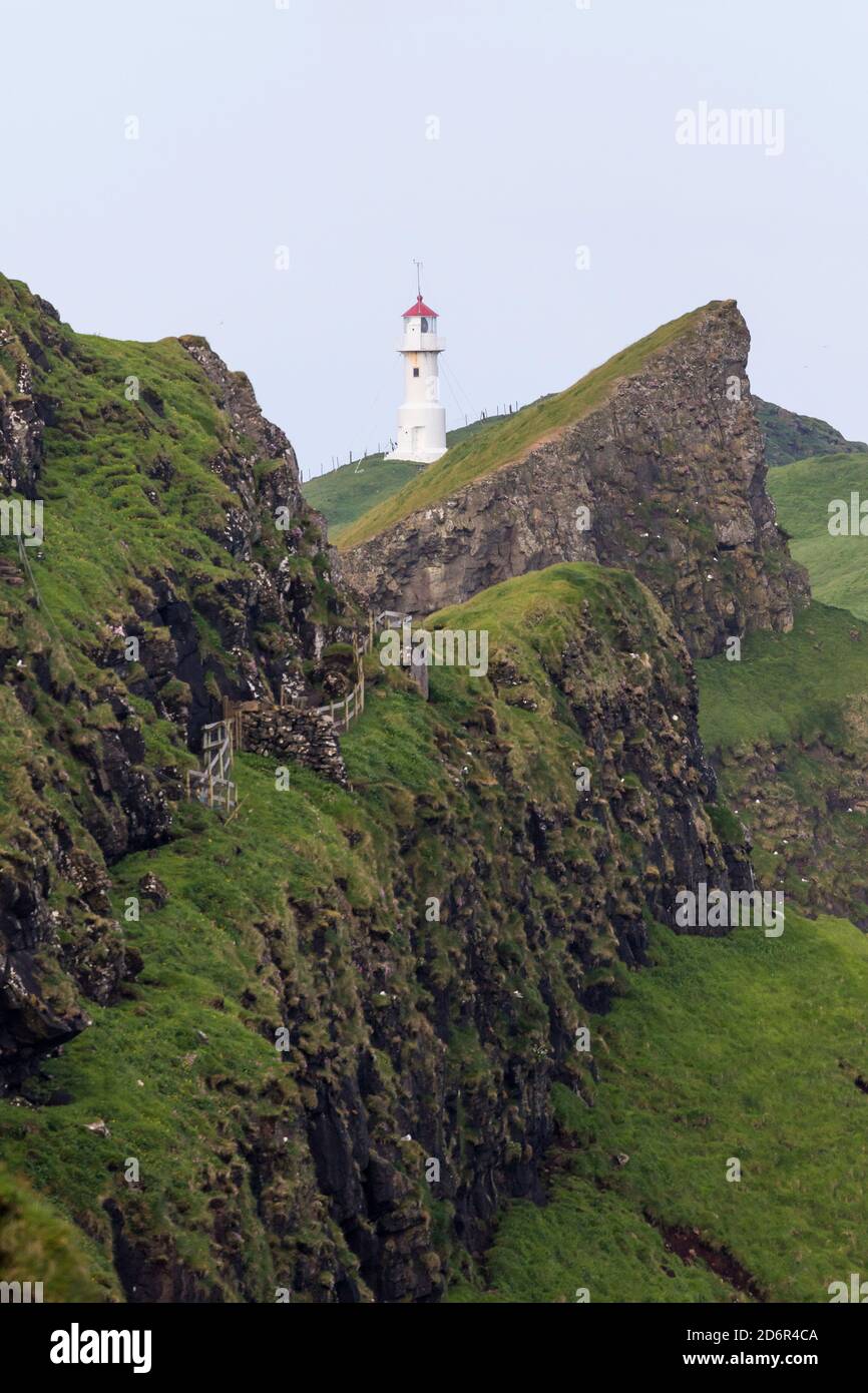 The lighthouse on Mykinesholmur, The island Mykines, part of the Faroe ...