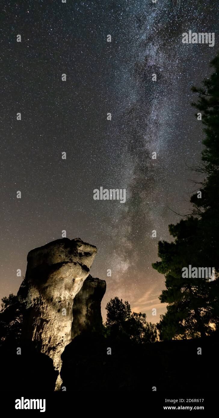 High boulder illuminated under the milky way Stock Photo - Alamy