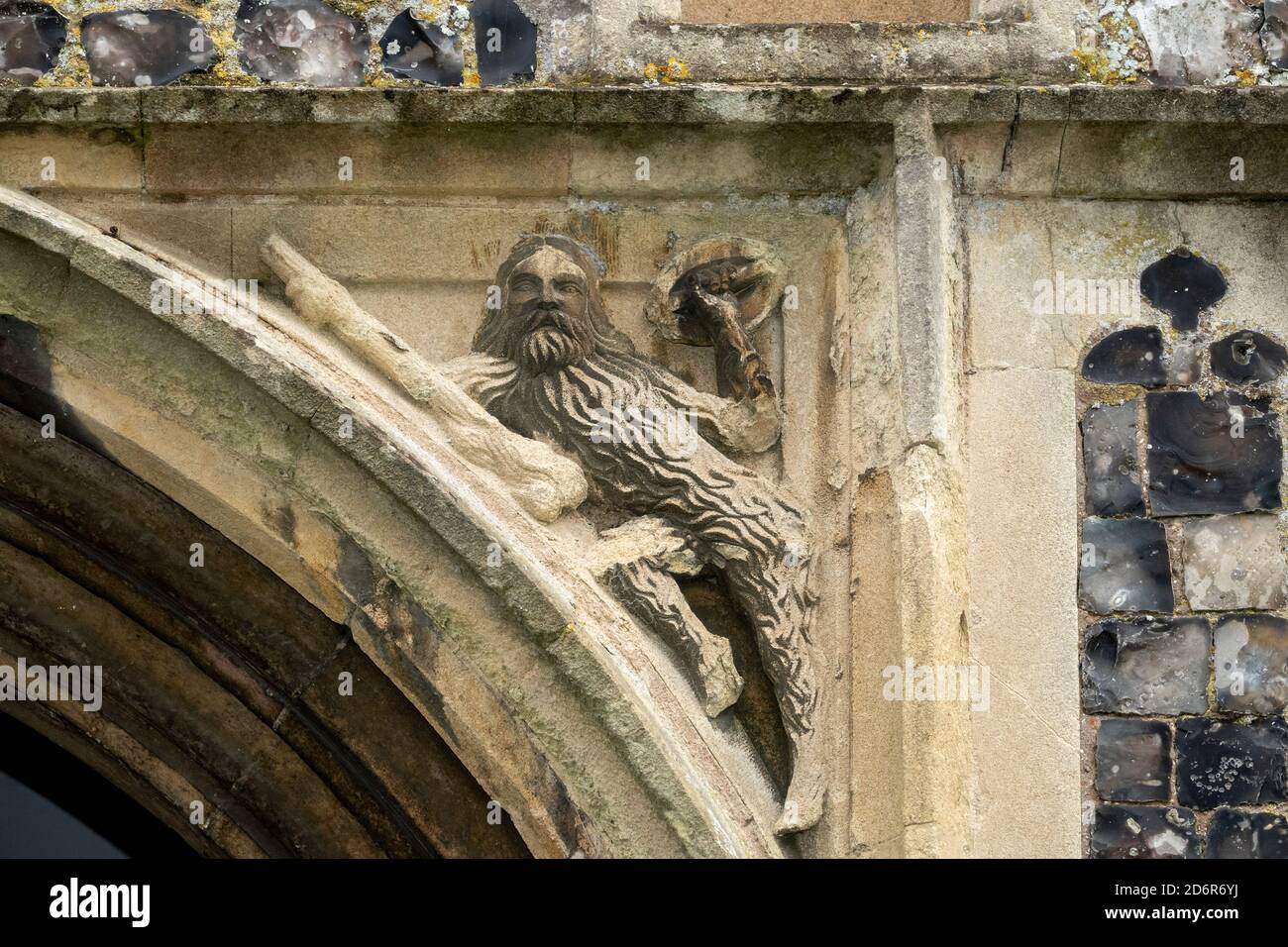 Woodwose over porch of Peasenhall Church, Suffolk Stock Photo - Alamy