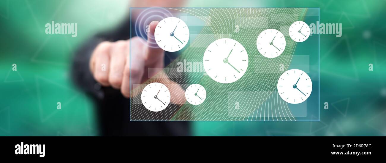 Man touching a time management concept on a touch screen with his ...