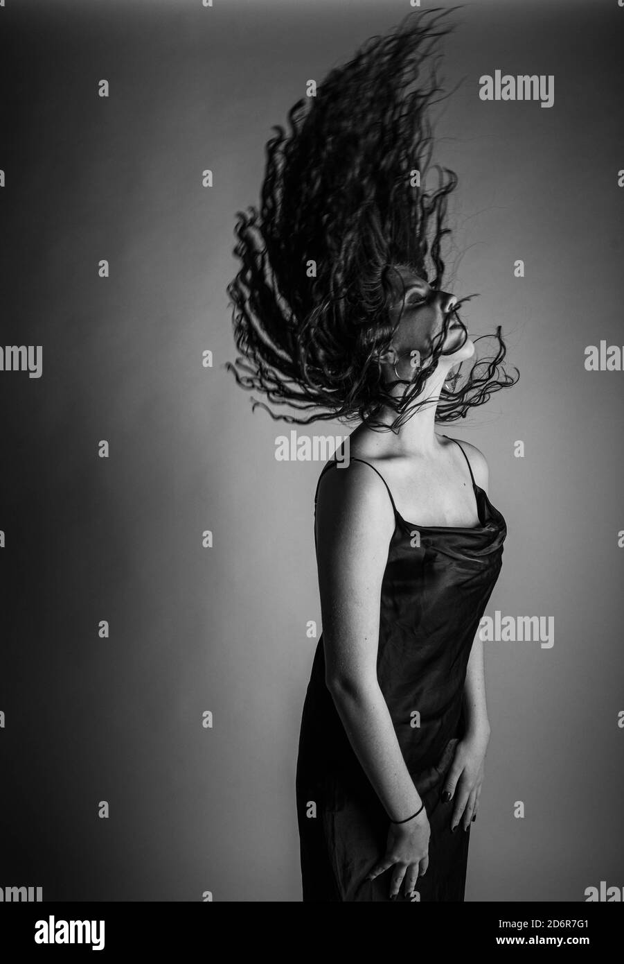 Hair flick hi-res stock photography and images - Alamy