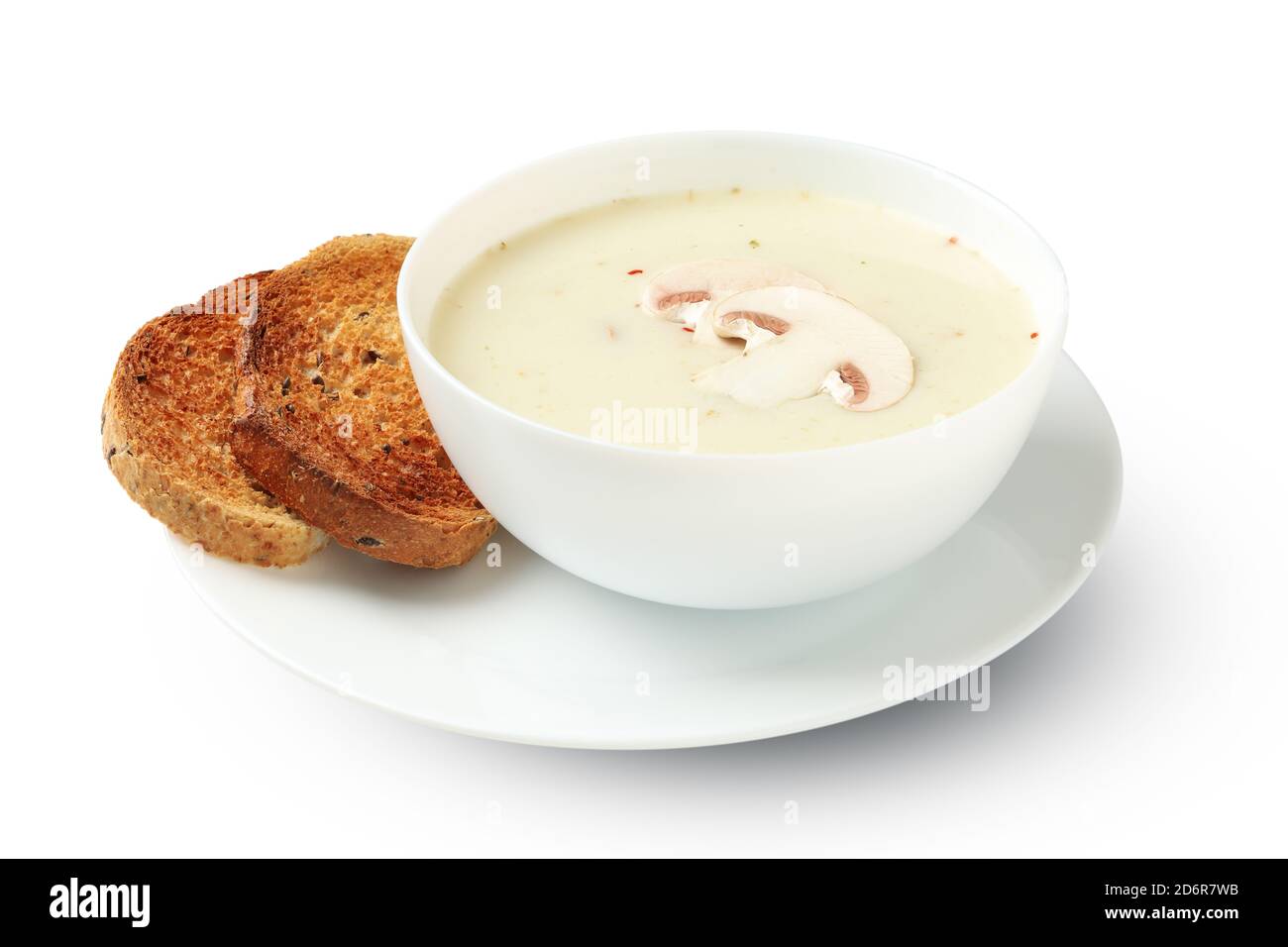 Plate with toast bread and bowl of mushroom soup isolated on white ...