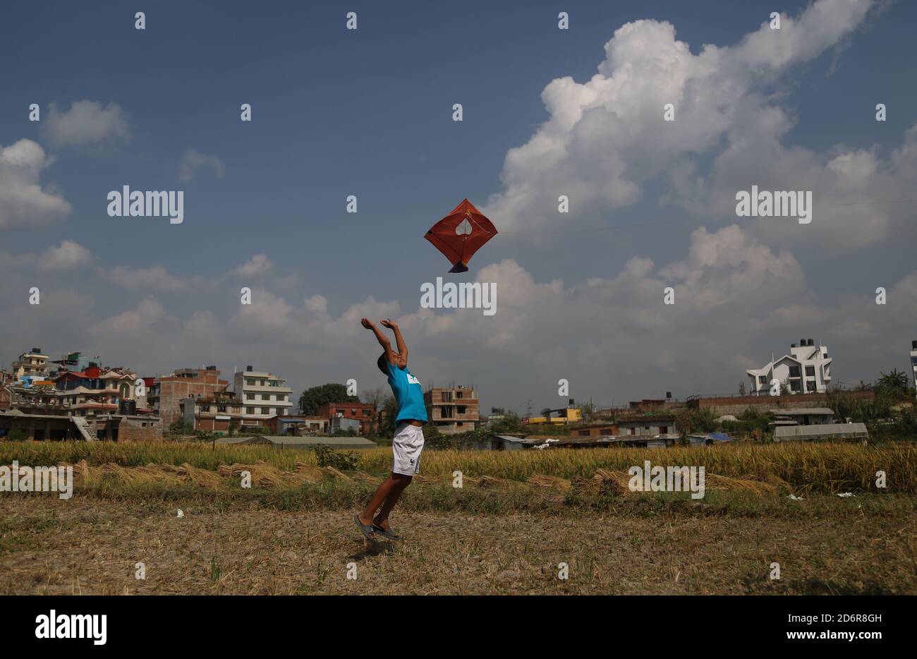 Kathmandu, Nepal. 19th Oct, 2020. A boy flies a kite ahead of Dashain ...