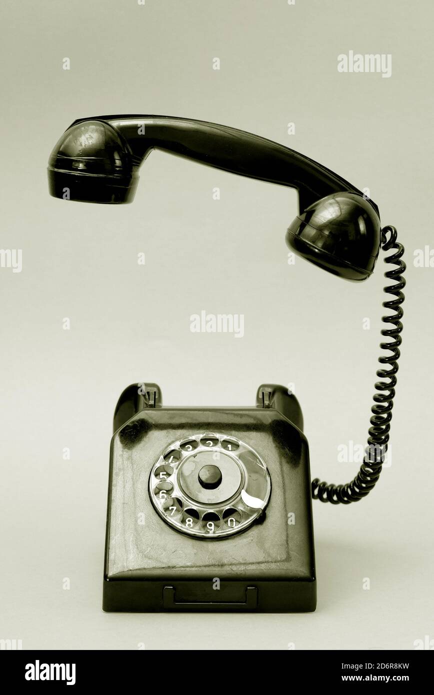 A vintage landline telephone on a colorful background Stock Photo - Alamy