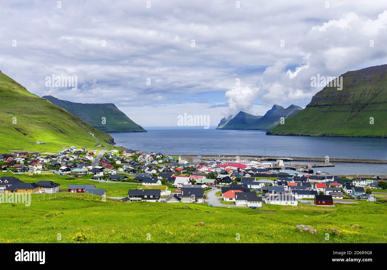 Small town Leirvik located at Leiriksfjordur. Mountains of the island ...