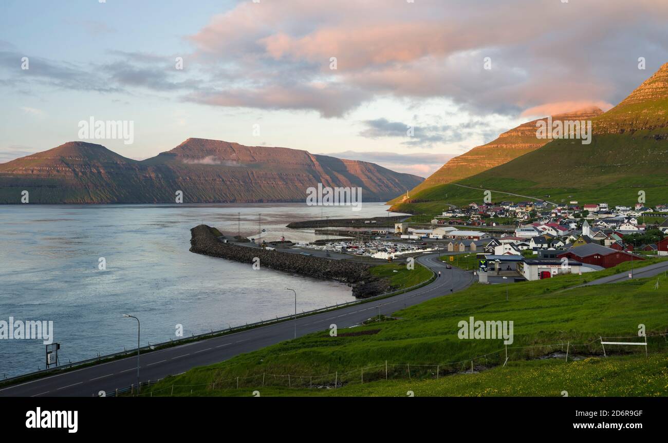 Small town Leirvik located at Leiriksfjordur. Mountains of the island ...