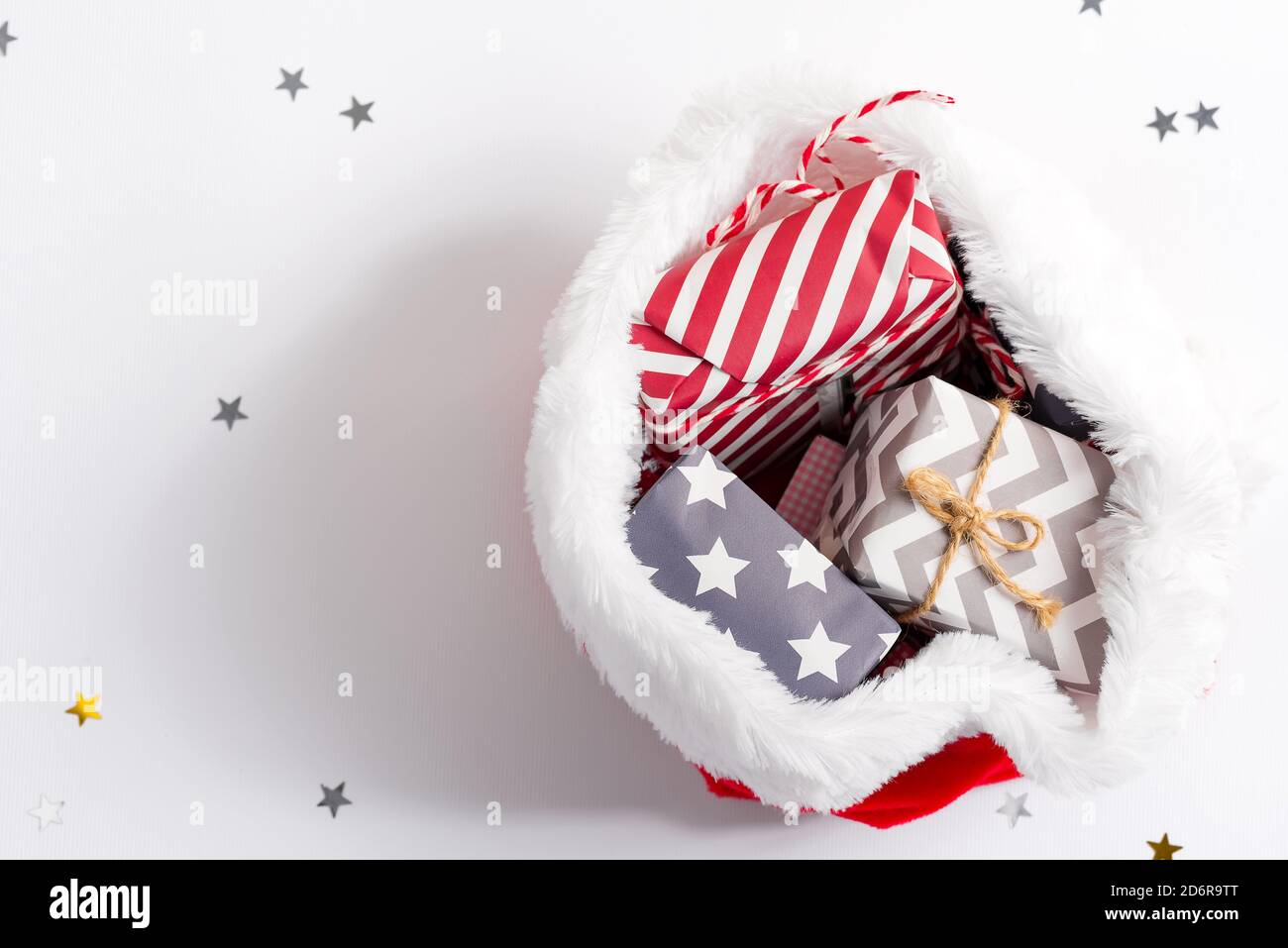 Christmas background with red Santa's hat filled colorful different ...