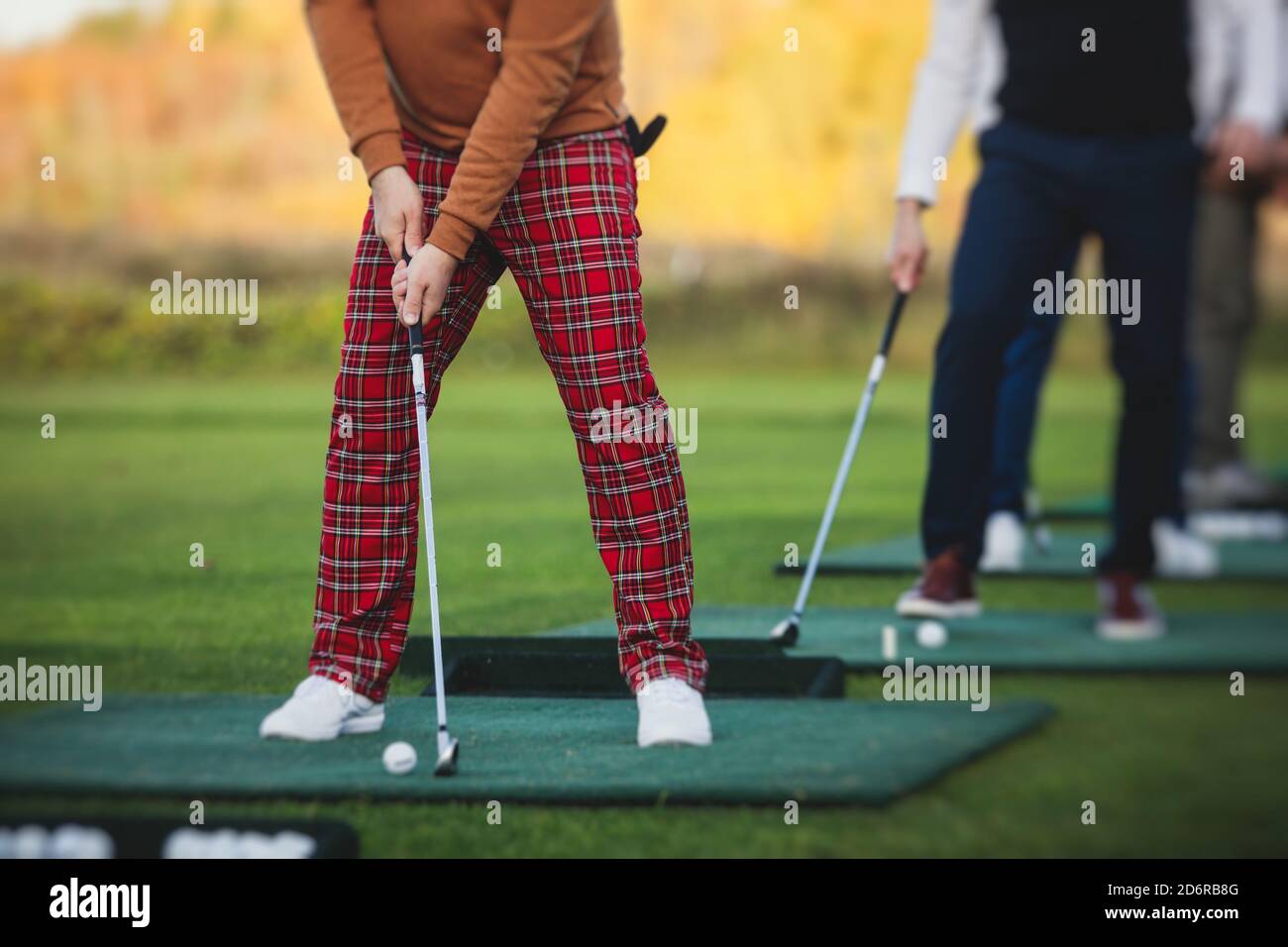 Golfers practicing driving range hi-res stock photography and images ...