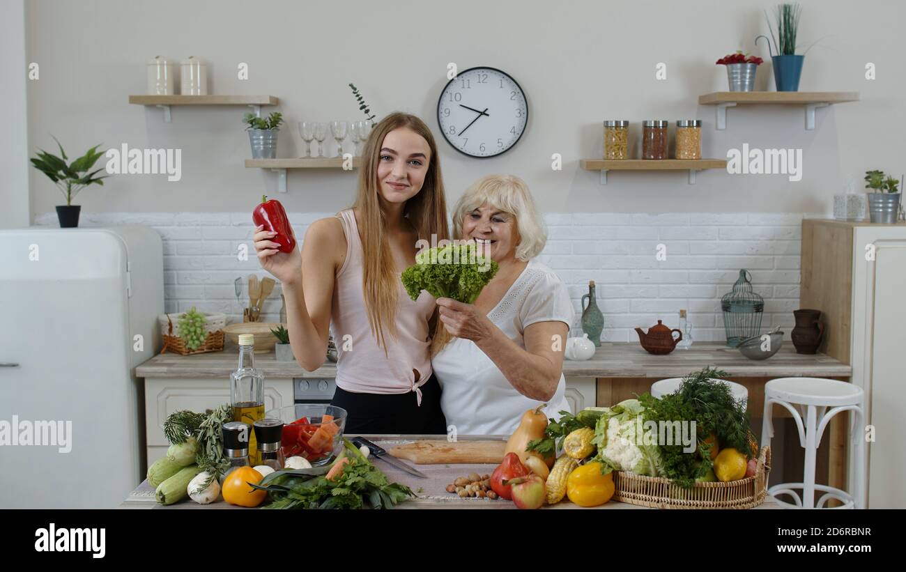 Mature woman grandchild girl recommending hi-res stock photography and ...