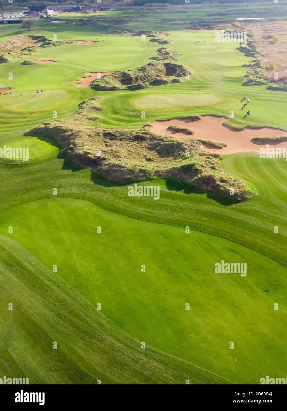 Aerial drone vibrant view of golf course in countryside, landscape ...