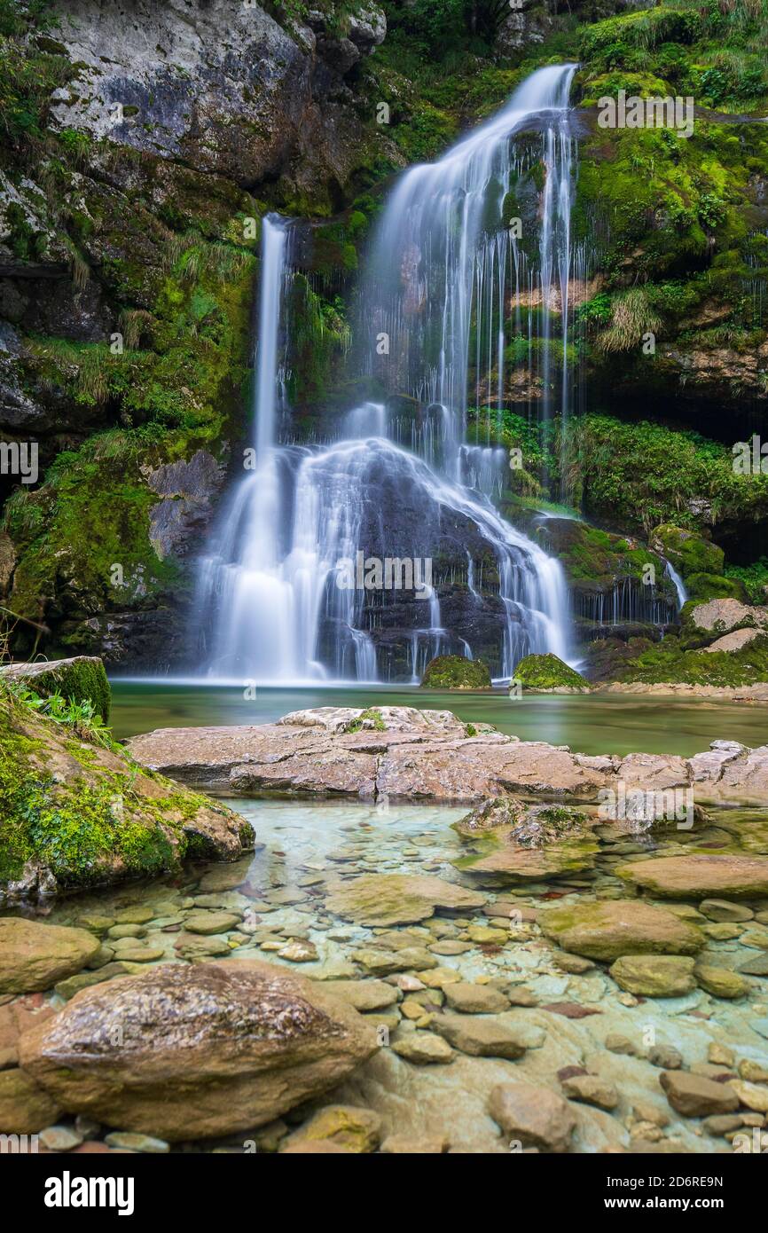 mystic waterfall on mossy rock Stock Photo - Alamy
