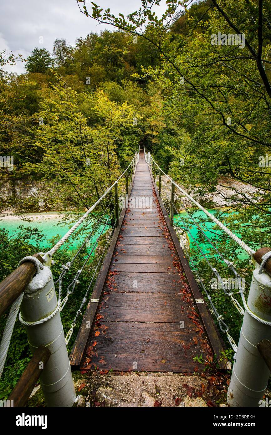 old wooden hanging bridge over soca river Stock Photo - Alamy