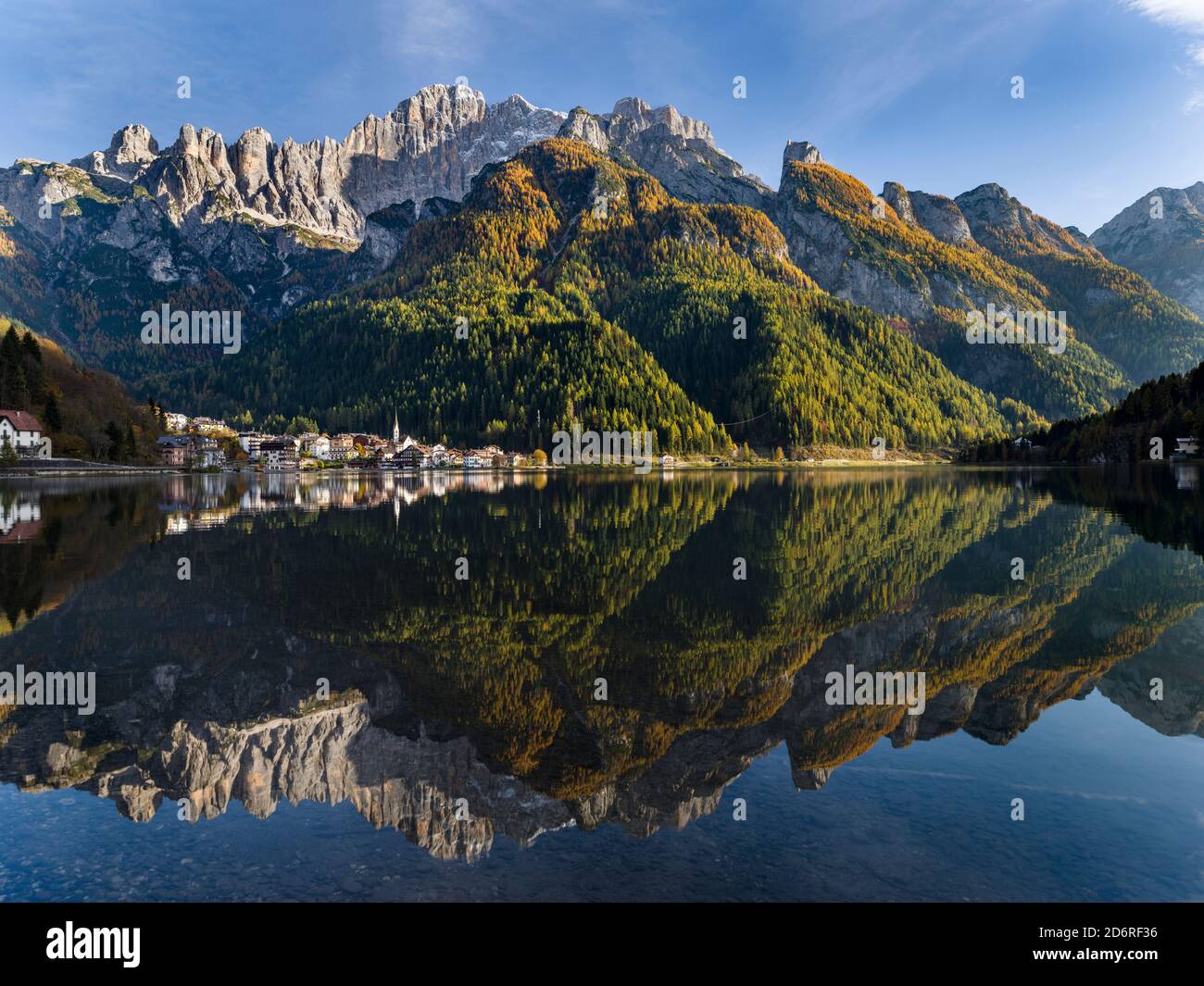 Village Alleghe at Lago di Alleghe at the foot of mount Civetta, one of ...