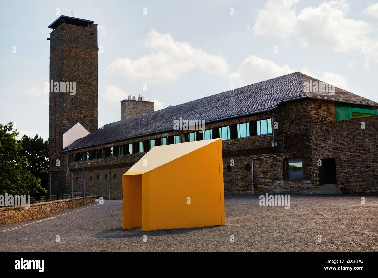former NS-Ordensburg Vogelsang, today memorial with yellow sculpture ...