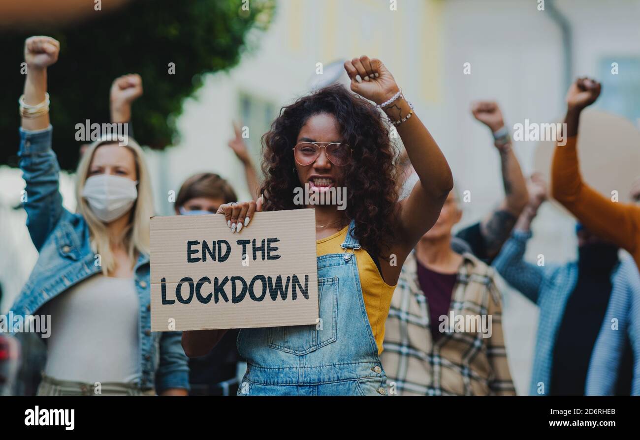 People with placards and posters on public demonstration, end of ...