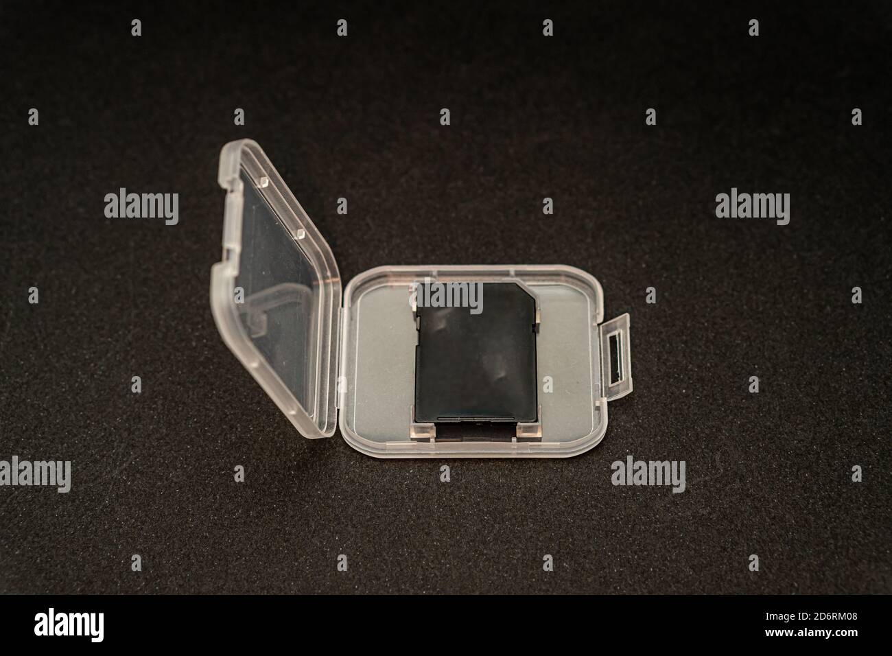 SD card box isolated on a black background Stock Photo - Alamy