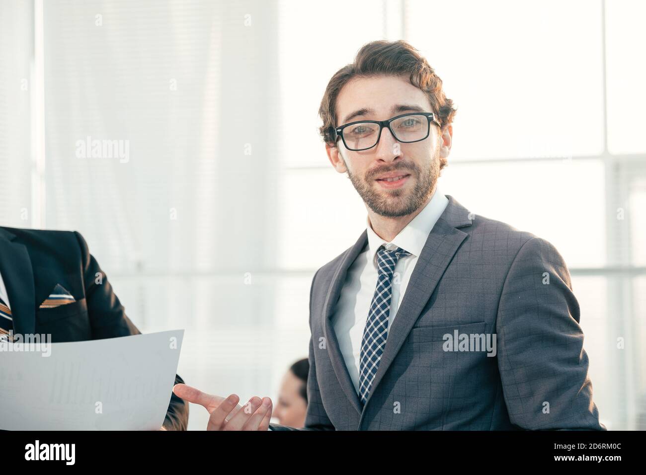 successful business man standing in the office Stock Photo - Alamy