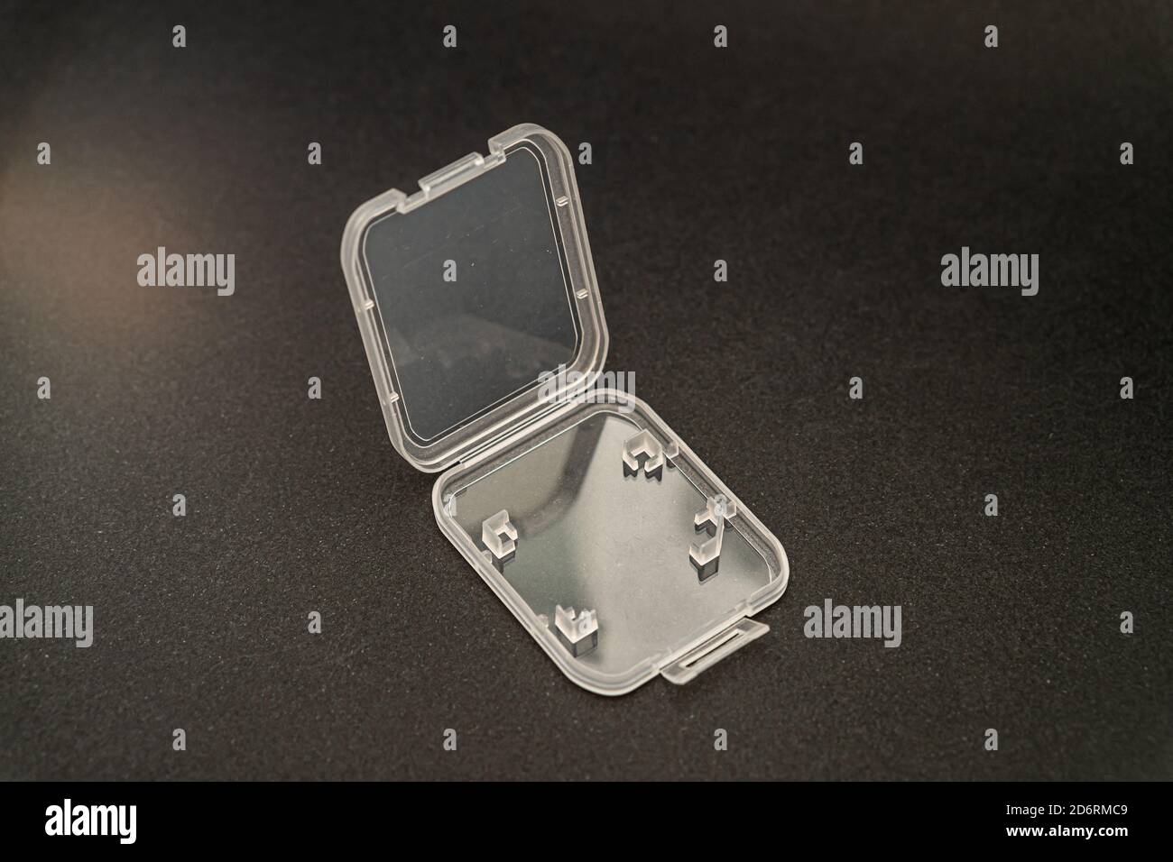 SD card box isolated on a black background Stock Photo - Alamy