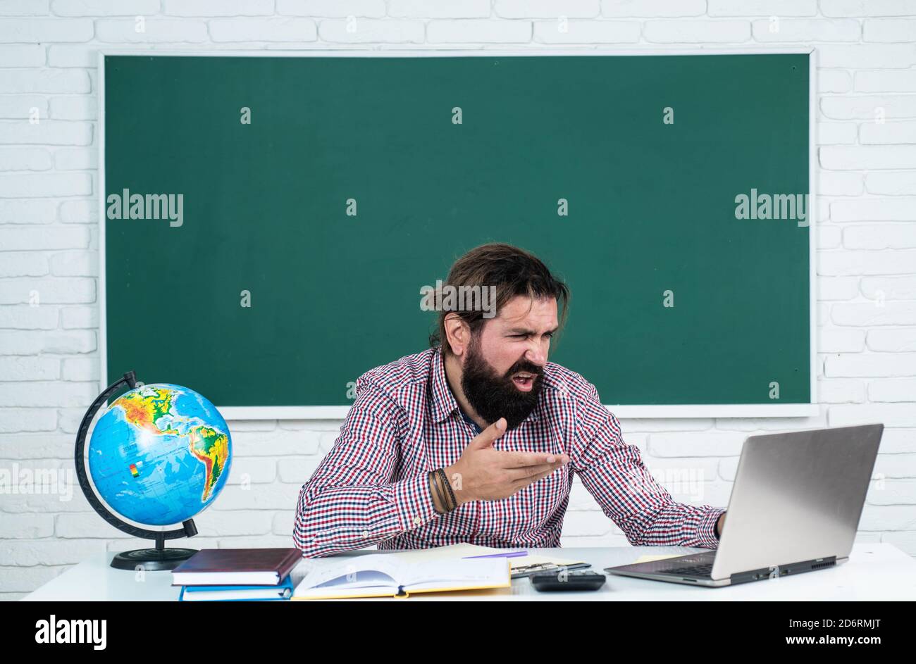 angry unhappy university student working on diploma project using ...