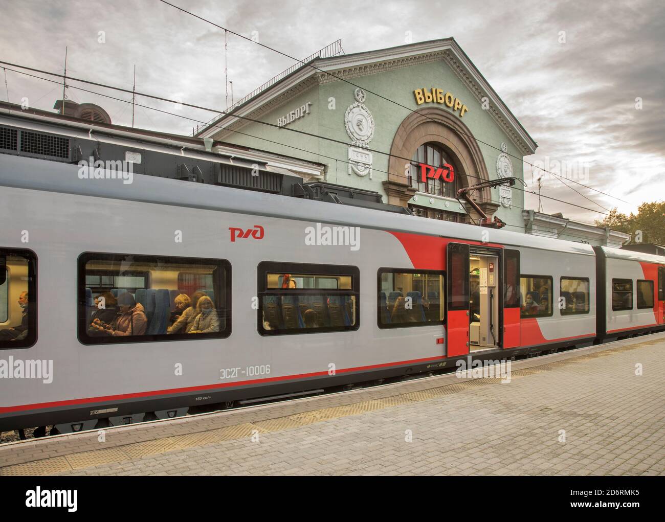 Lastochka (Swallow) train at railway station in Vyborg. Russia Stock ...