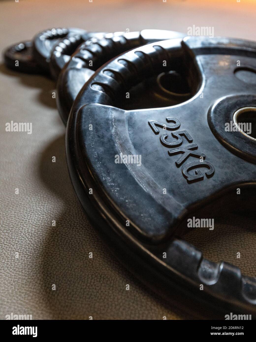 25 kg barbell weights isolated Stock Photo - Alamy