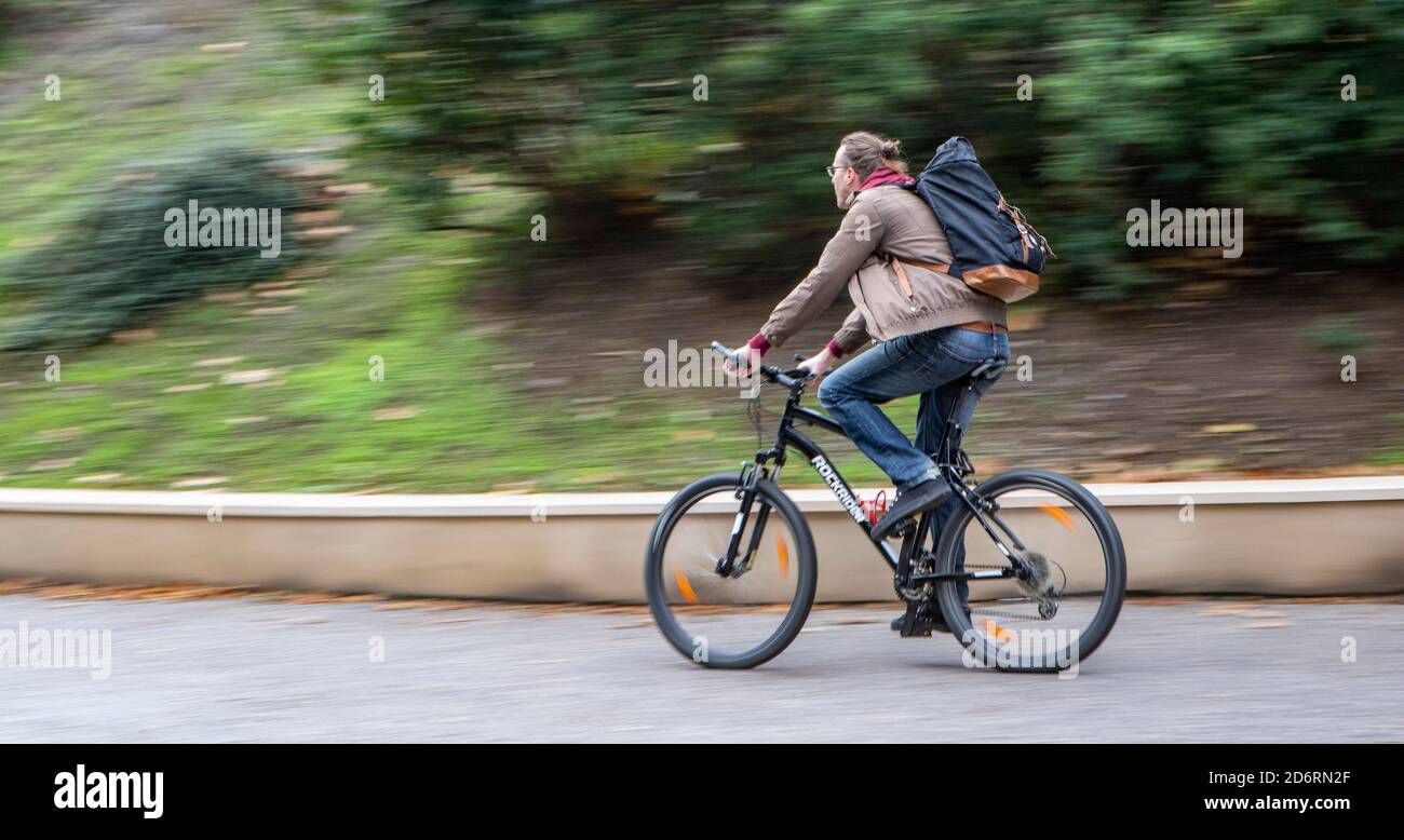 Cycling without helmet hi-res stock photography and images - Alamy
