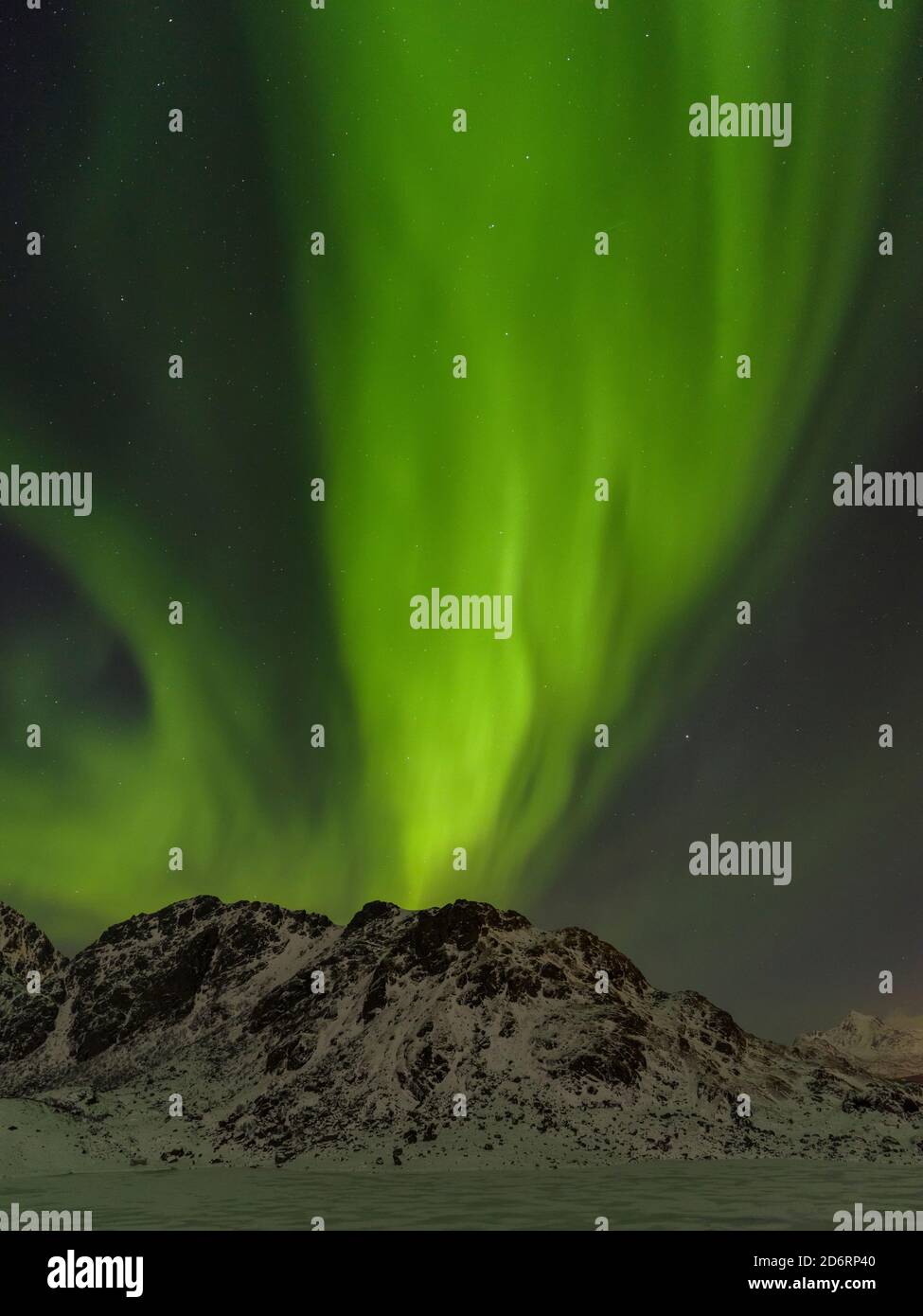 Northern Lights over the frozen lake Vikvatnet near Leknes, island ...