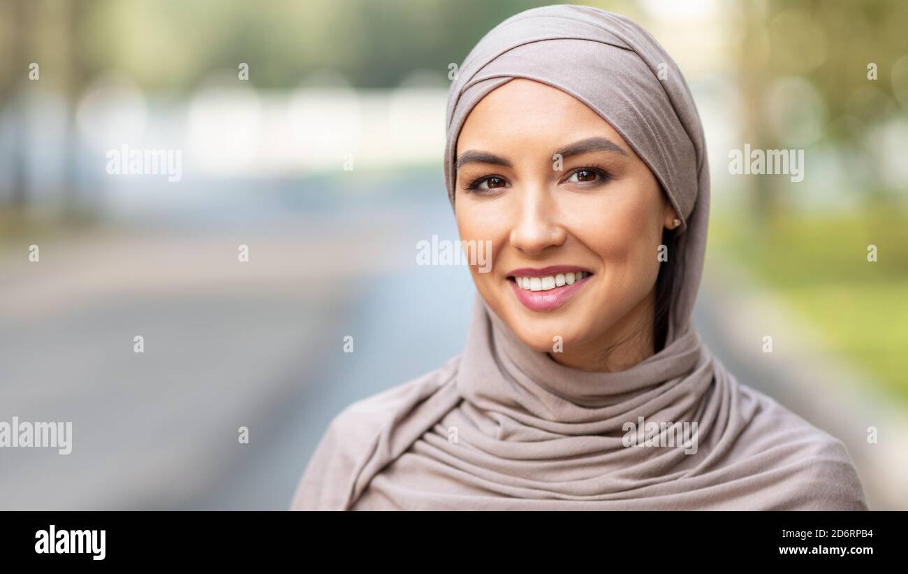 Modern Muslim Young Woman In Hijab Smiling Posing Outdoors, Panorama ...