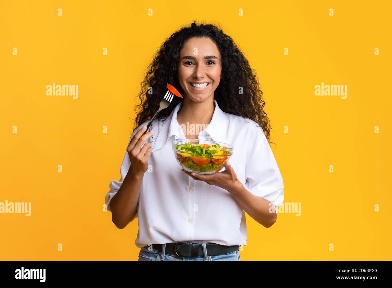 Healthy Nutrition. Cheerful Young Woman Eating Vegetable Salad ...