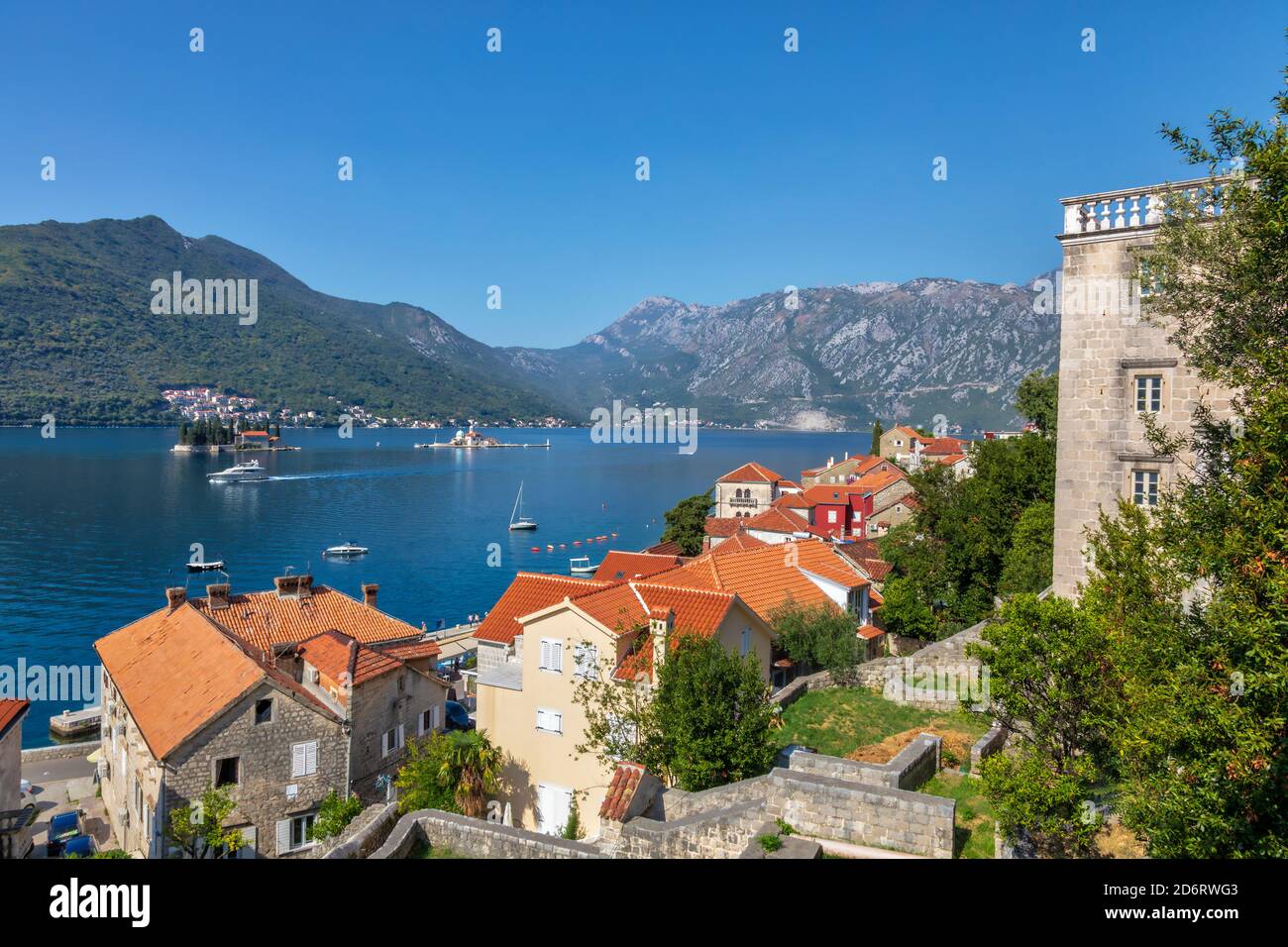 Top view of the houses and streets of the old coastal town of Perast ...