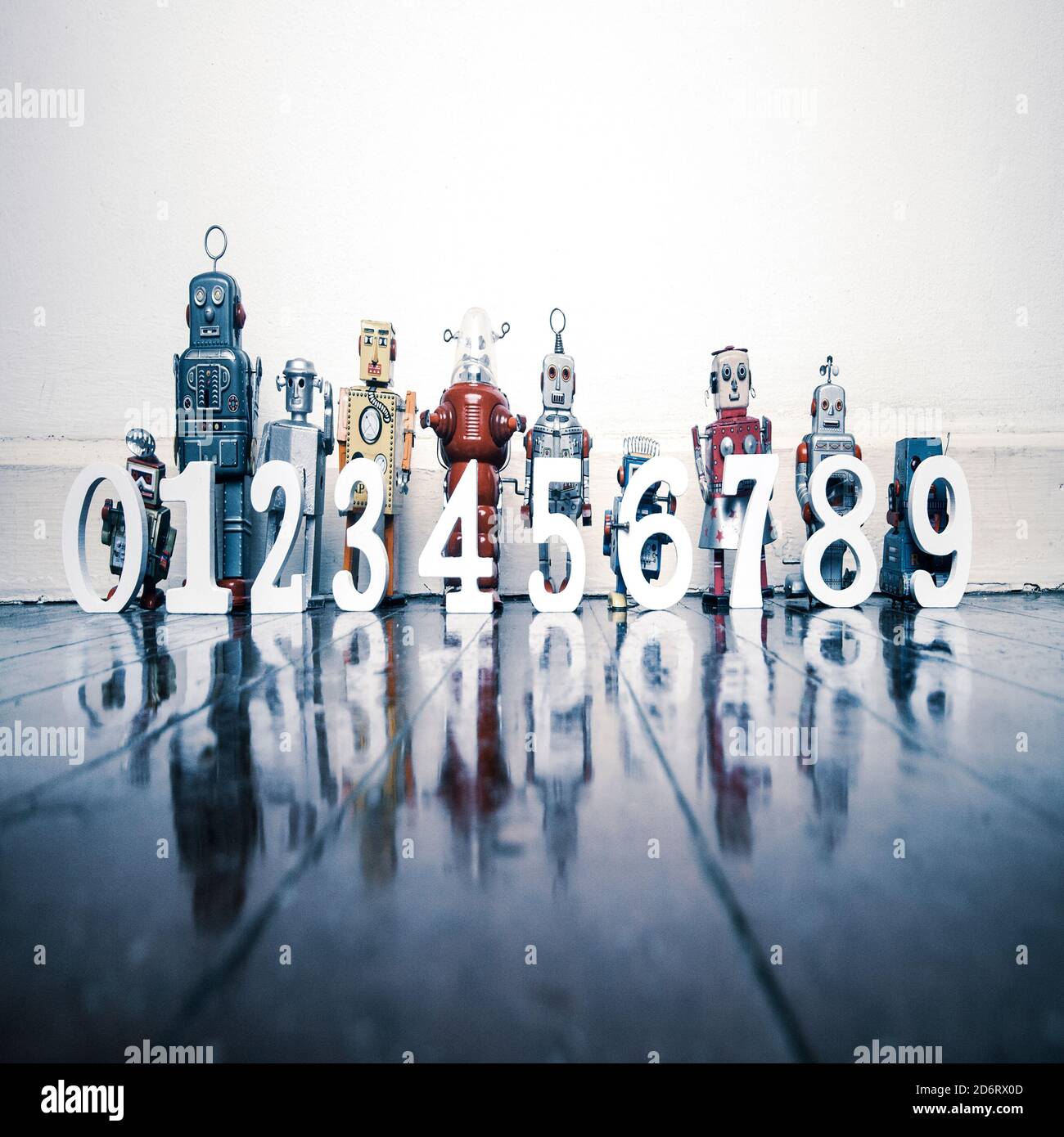 counting retro robots 0 to 9 on a wooden floor with reflection Stock ...