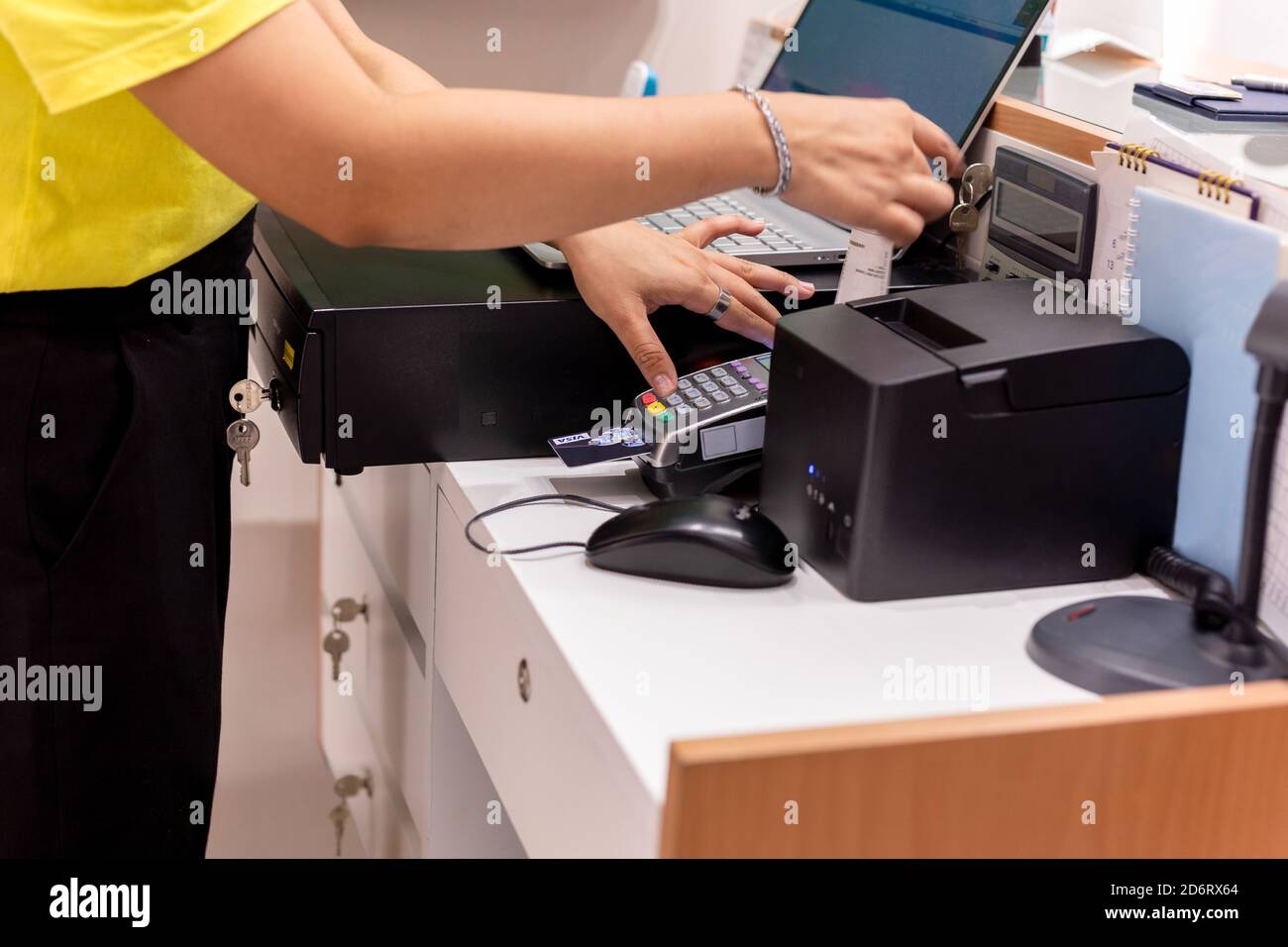 Hand taking receipt from credit card reader at counter service Stock ...