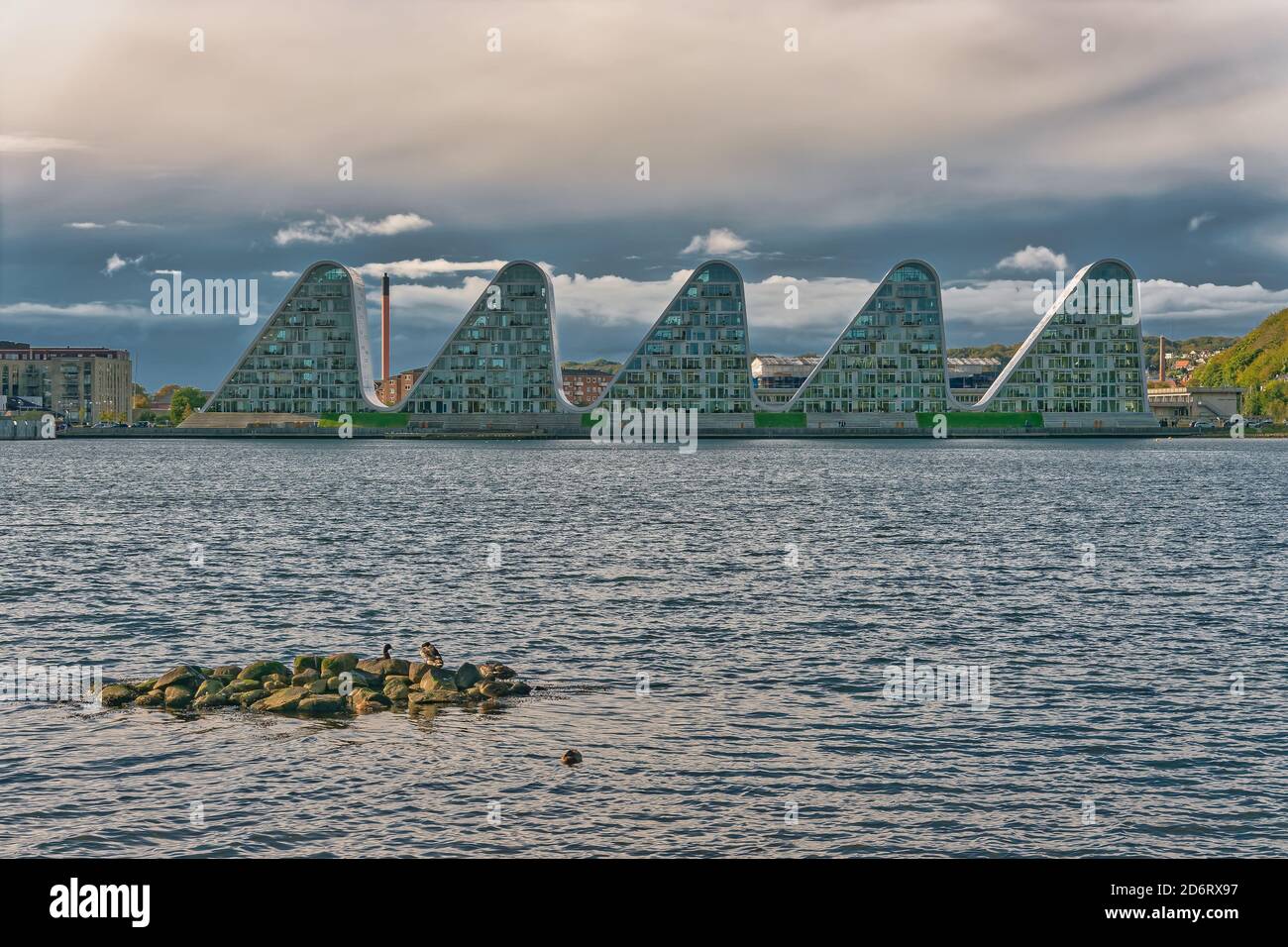 The wave boelgen iconic modern apartments in Vejle, Denmark Stock Photo ...