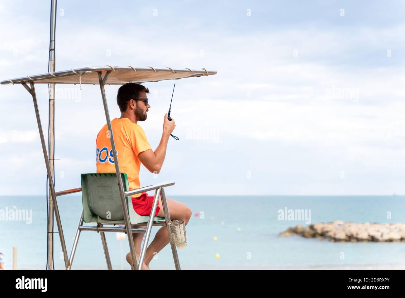 Employee using walkie talkie hi-res stock photography and images - Alamy