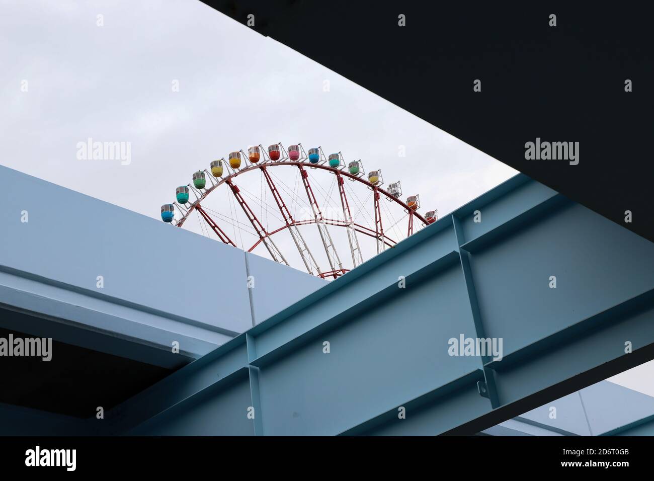 TOKYO, JAPAN - Jan 12, 2020: The top of a Ferris wheel can be seen ...