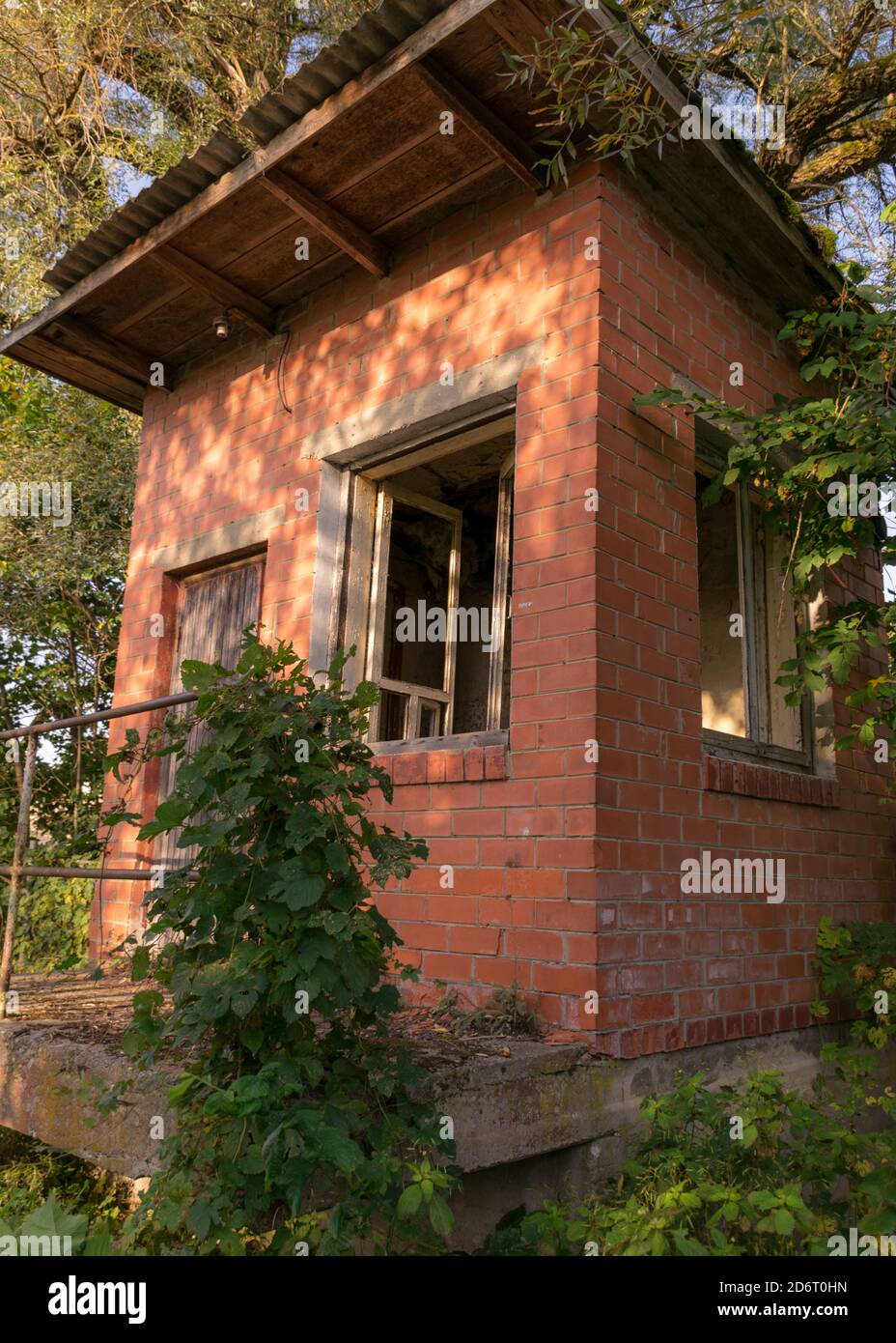 picture with an old red brick house, window frames without glass Stock ...