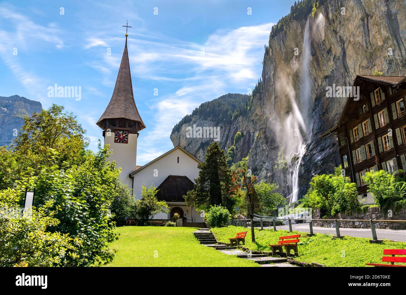The church and the Staubbach Falls in Lauterbrunnen, Switzerland Stock ...